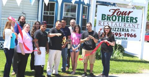 Four Brothers Restaurant and Pizza celebrates grand opening at new location