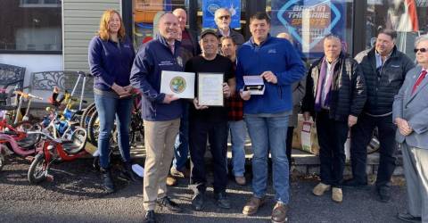 Business owner Robbie Jacobs honored by village