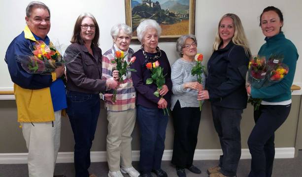 Rotarians donate 430 roses to seniors
