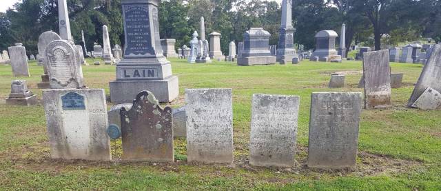 Who's buried in the Warwick Cemetery?